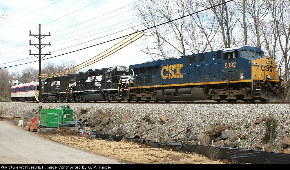 284 - WOW! CSX, NS, NS, FRA! W00716 drifts past the west end Reusens